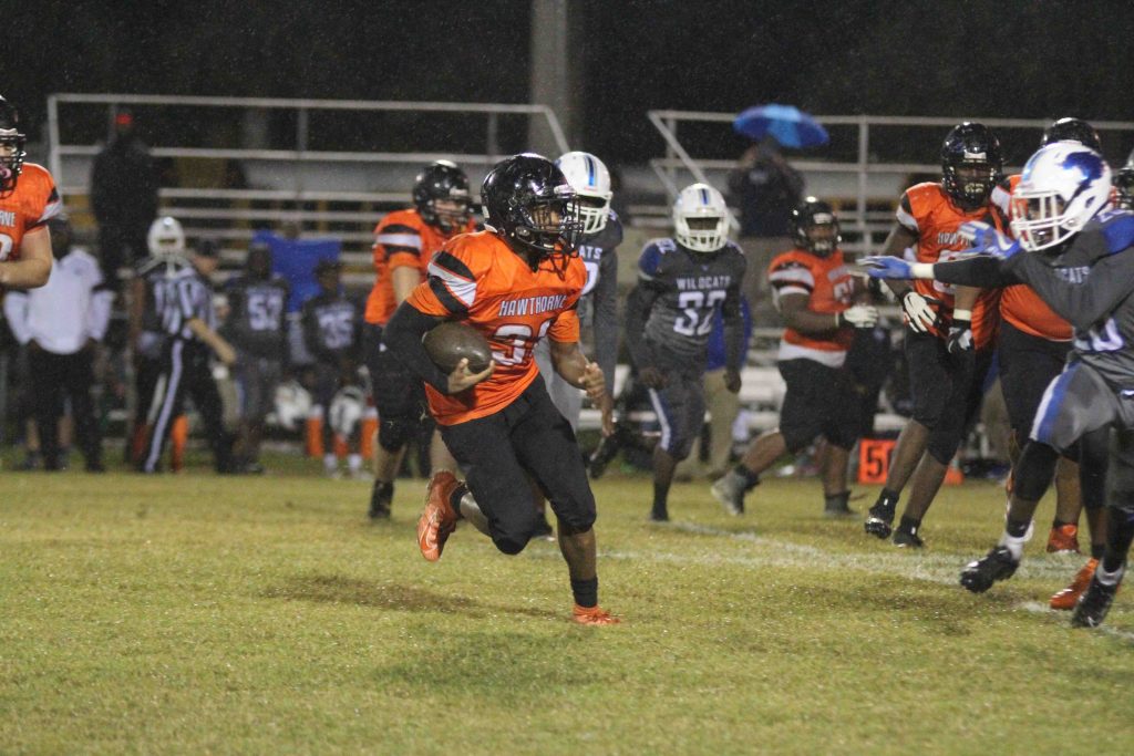 Hawthorne Football Defeats Wildwood 37-21 in a Rainy Battle to Move on ...